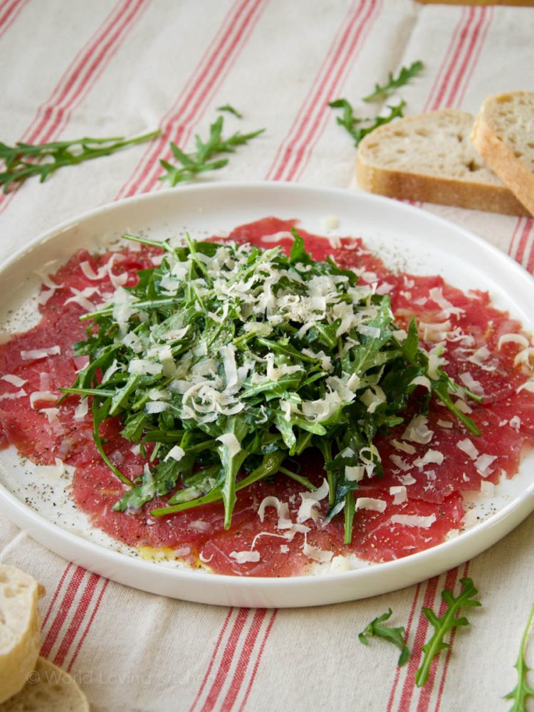 Classic Beef Carpaccio with Arugula Salad and Parmesan Cheese – World ...