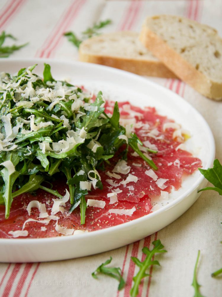 Classic Beef Carpaccio with Arugula Salad and Parmesan Cheese – World ...