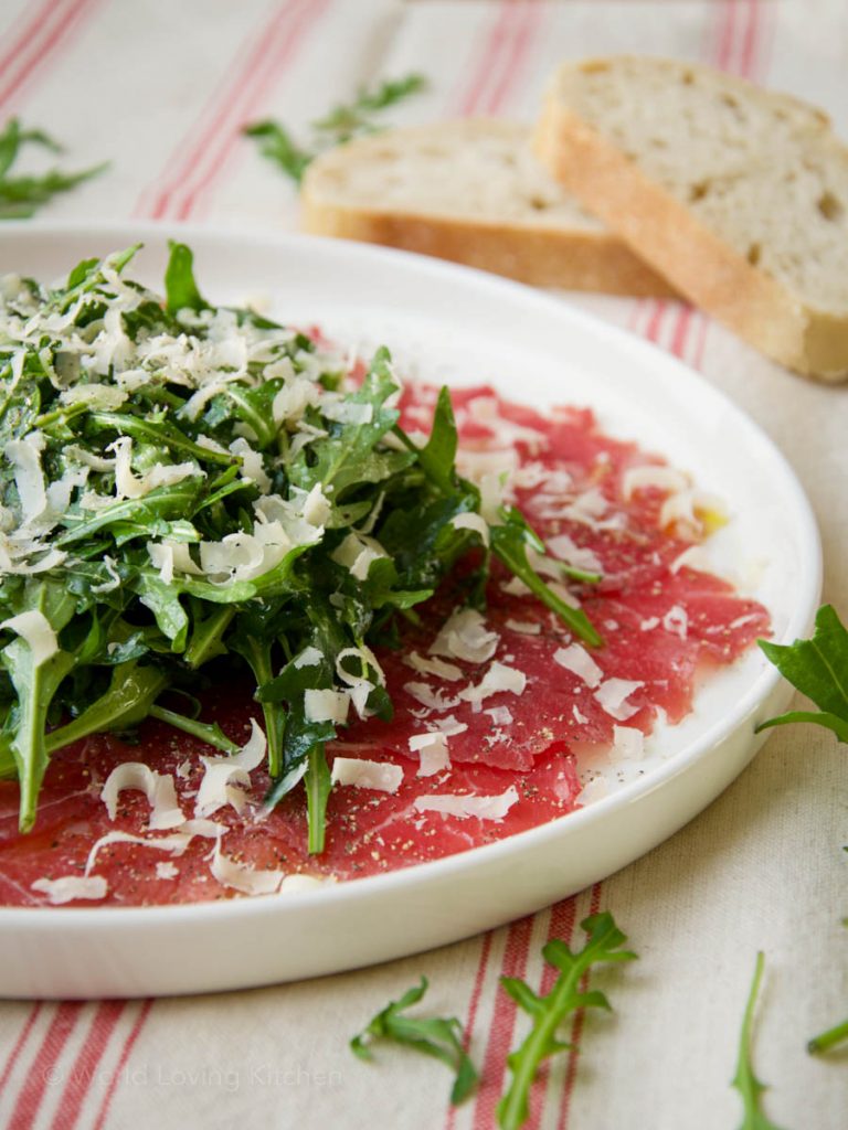Classic Beef Carpaccio with Arugula Salad and Parmesan Cheese – World ...